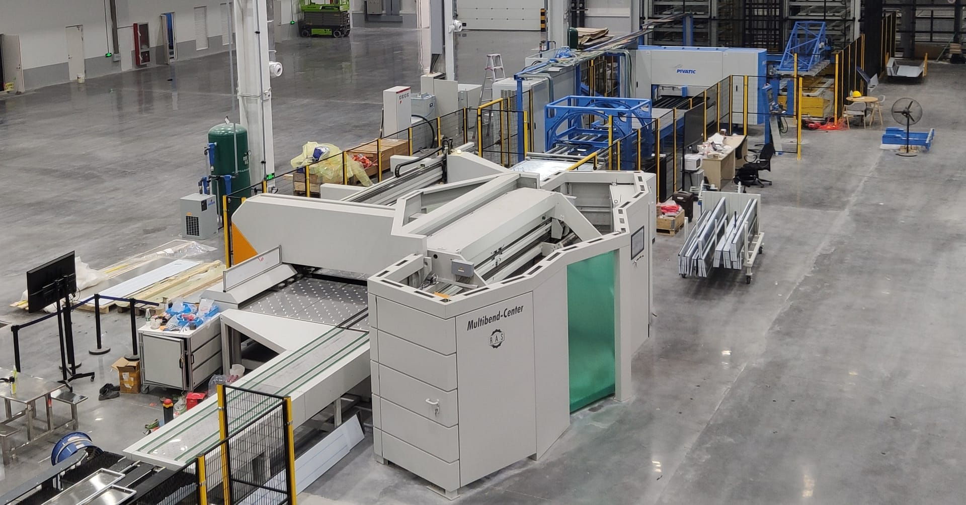 Sheet punching as part of an integrated sheet metal production system ...